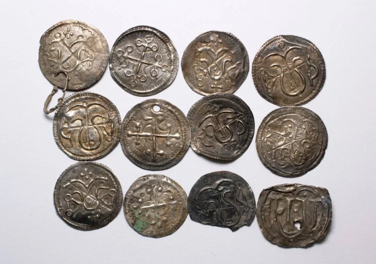 Rare silver coins minted by Viking king Harald Bluetooth discovered in ...