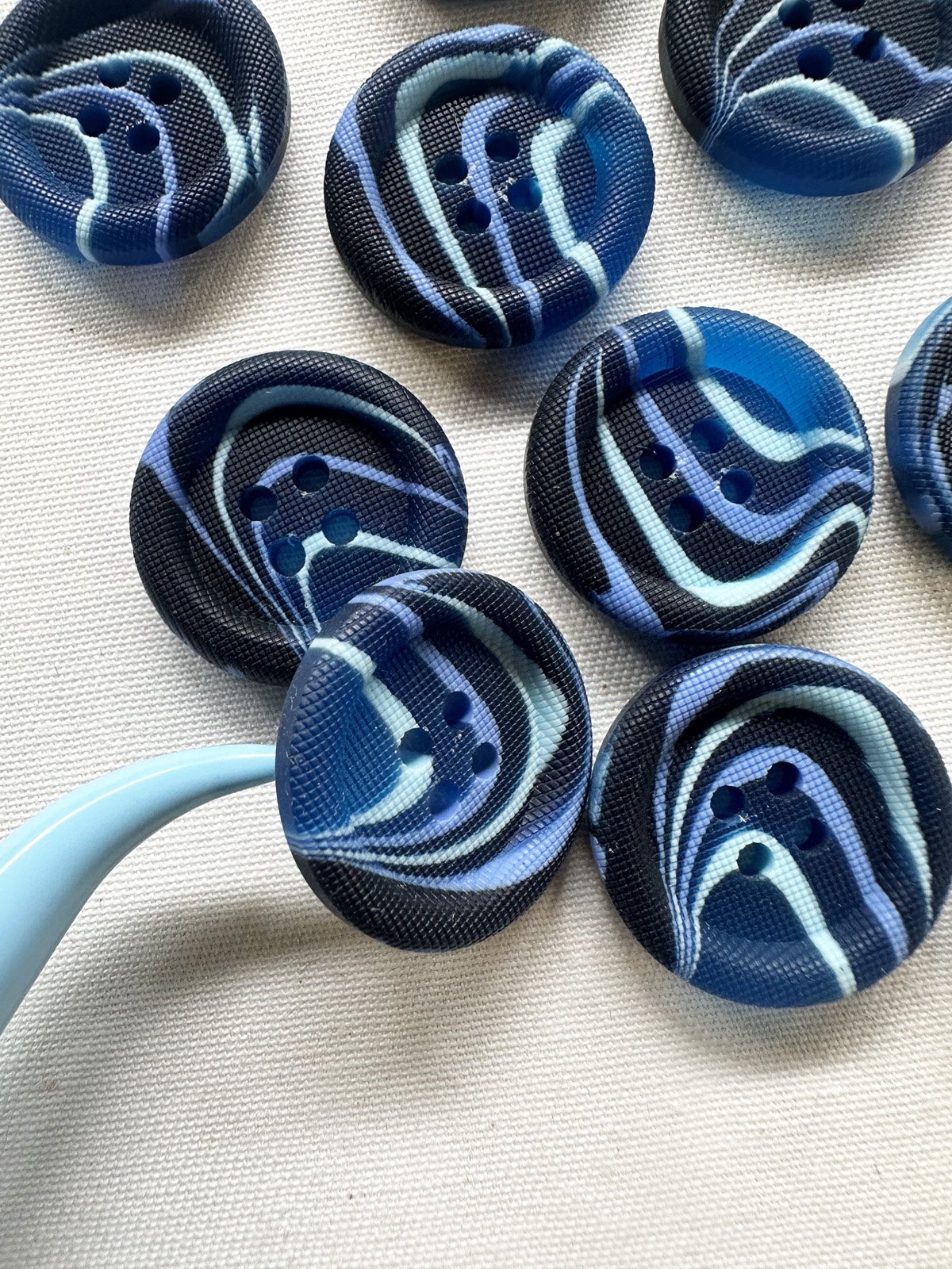 Dozen Blue Oceanic Jacket Buttons — L'Etoffe Fabrics Online