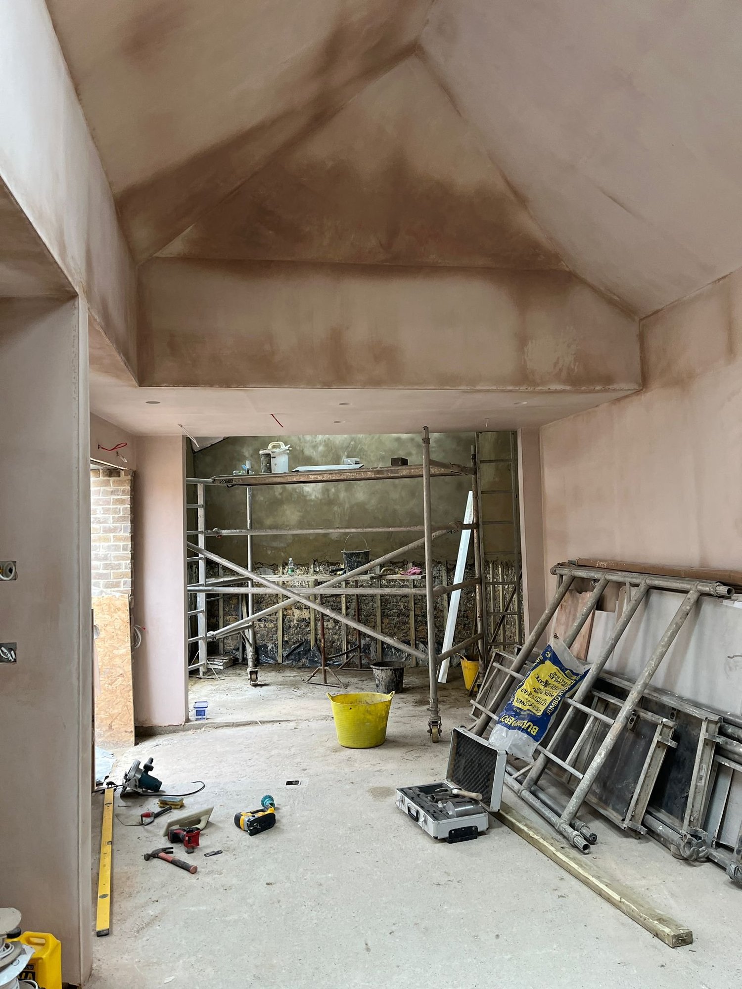 Plastering, the kitchen and sliding doors, our home is coming together ...