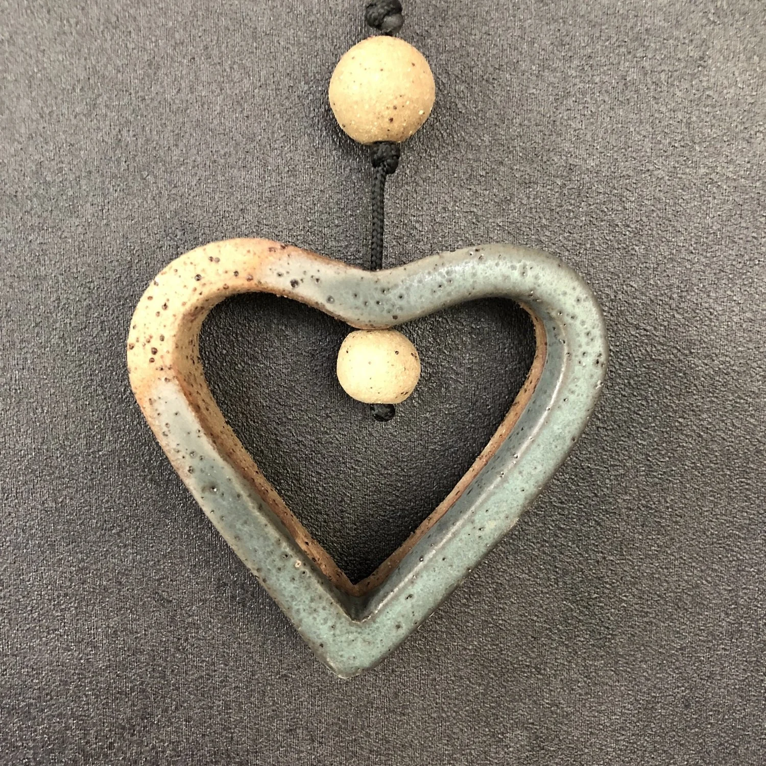 Hanging Hearts — burnt sand pottery
