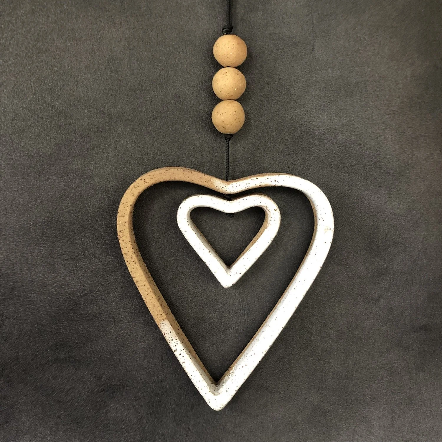 Hanging Hearts — burnt sand pottery