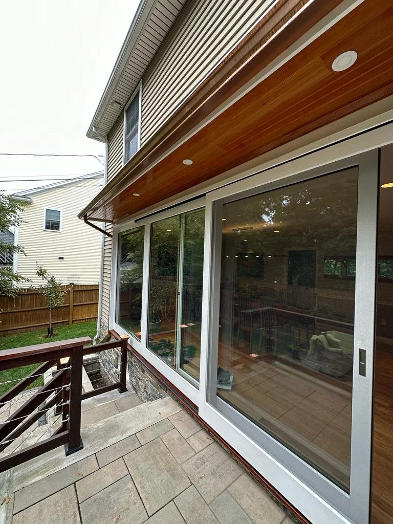 16' Sliding glass door with an accent soffit and copper roof — Iannelli ...