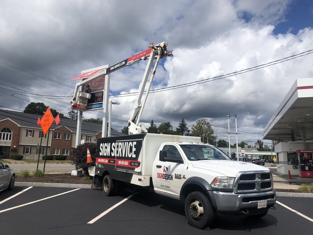 Service — Sign Design, Inc.