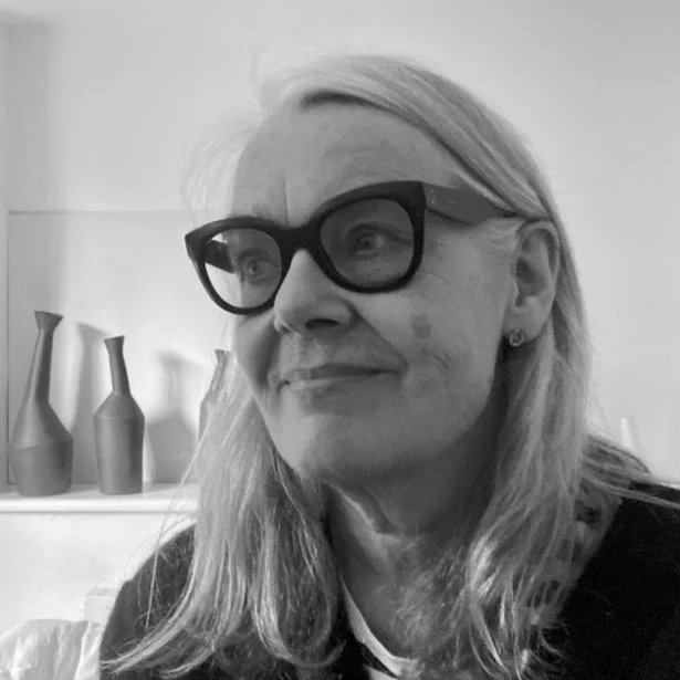 About 1 — CAROLINE GRAY