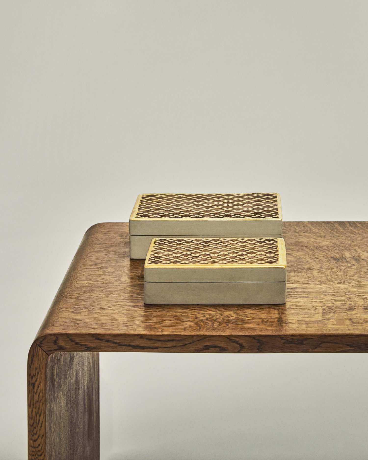 Two lidded boxes in brushed and painted oak by Jean-Michel, circa 1937 ...