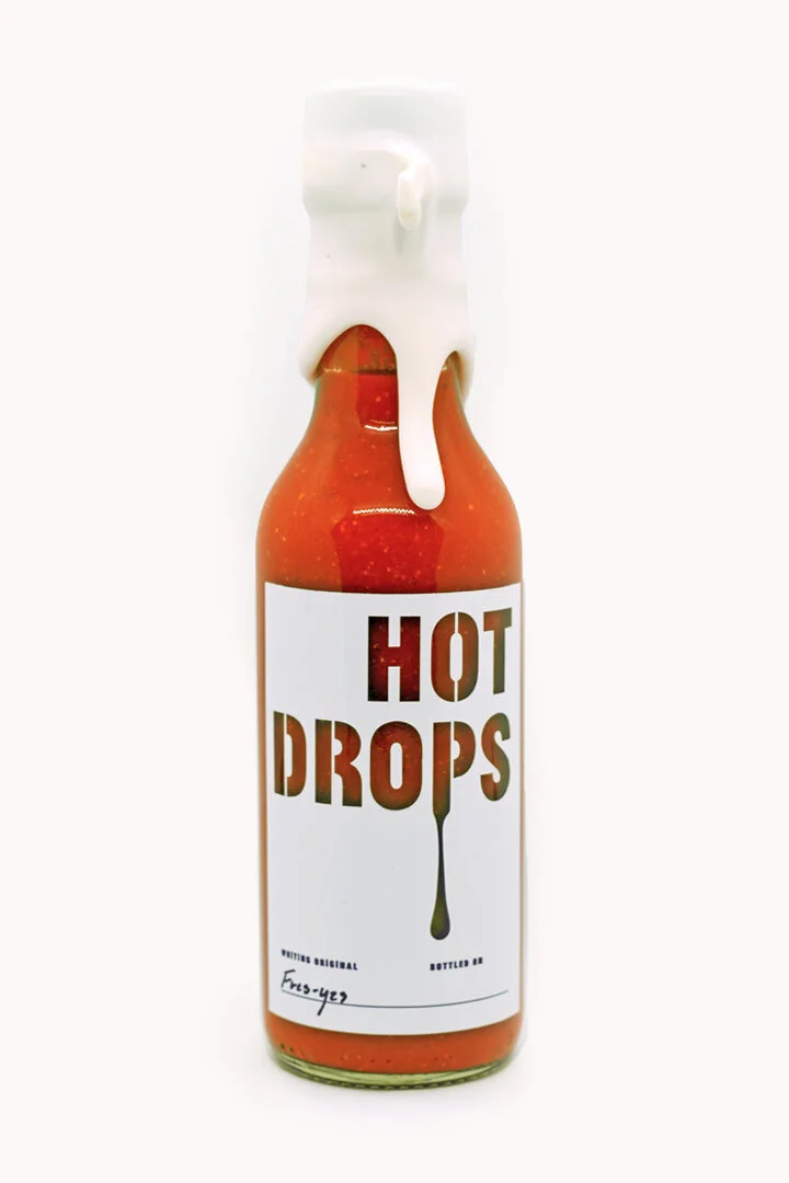 Hot Drops. Hot sauce that doesn’t melt your mind but warms your soul.