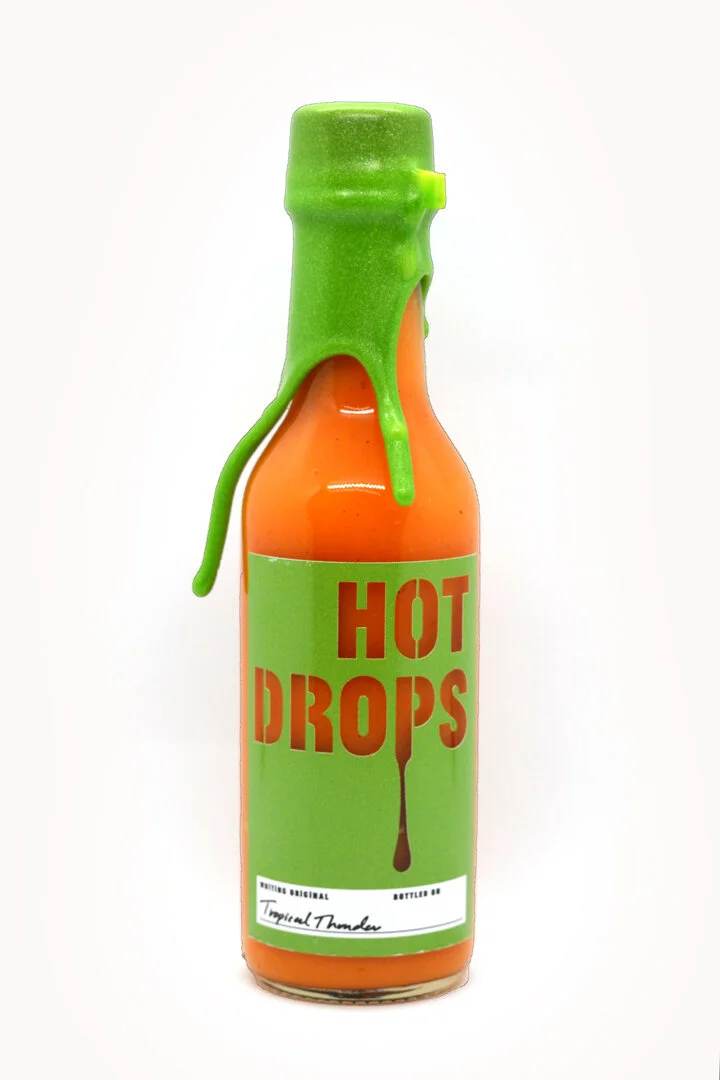 Hot Drops. Hot sauce that doesn’t melt your mind but warms your soul.