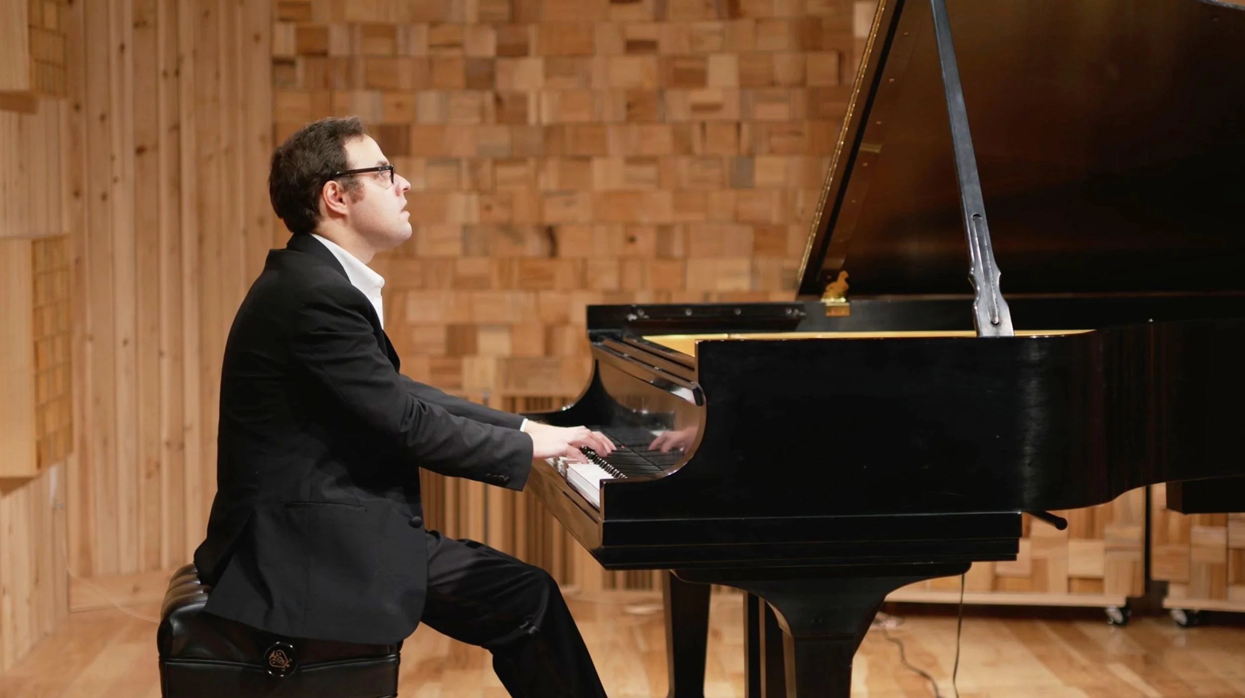 Michael Kaykov. Bio — Michael Kaykov. Pianist and Educator.