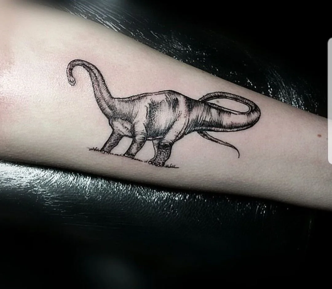 8 Dinosaur Tattoo Ideas For Inspo | With Examples — TRILOGY ATELIER