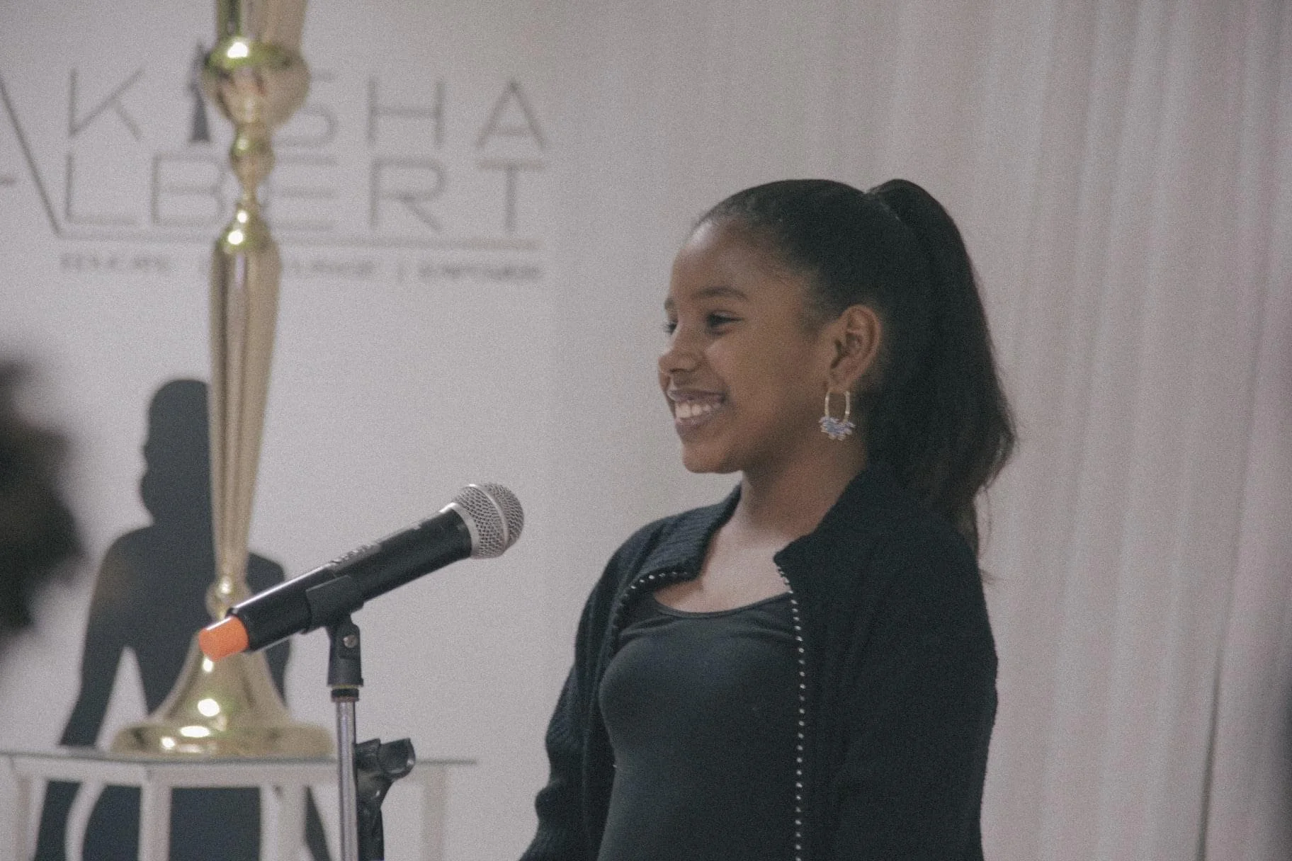 Contact 1 — Akisha Albert