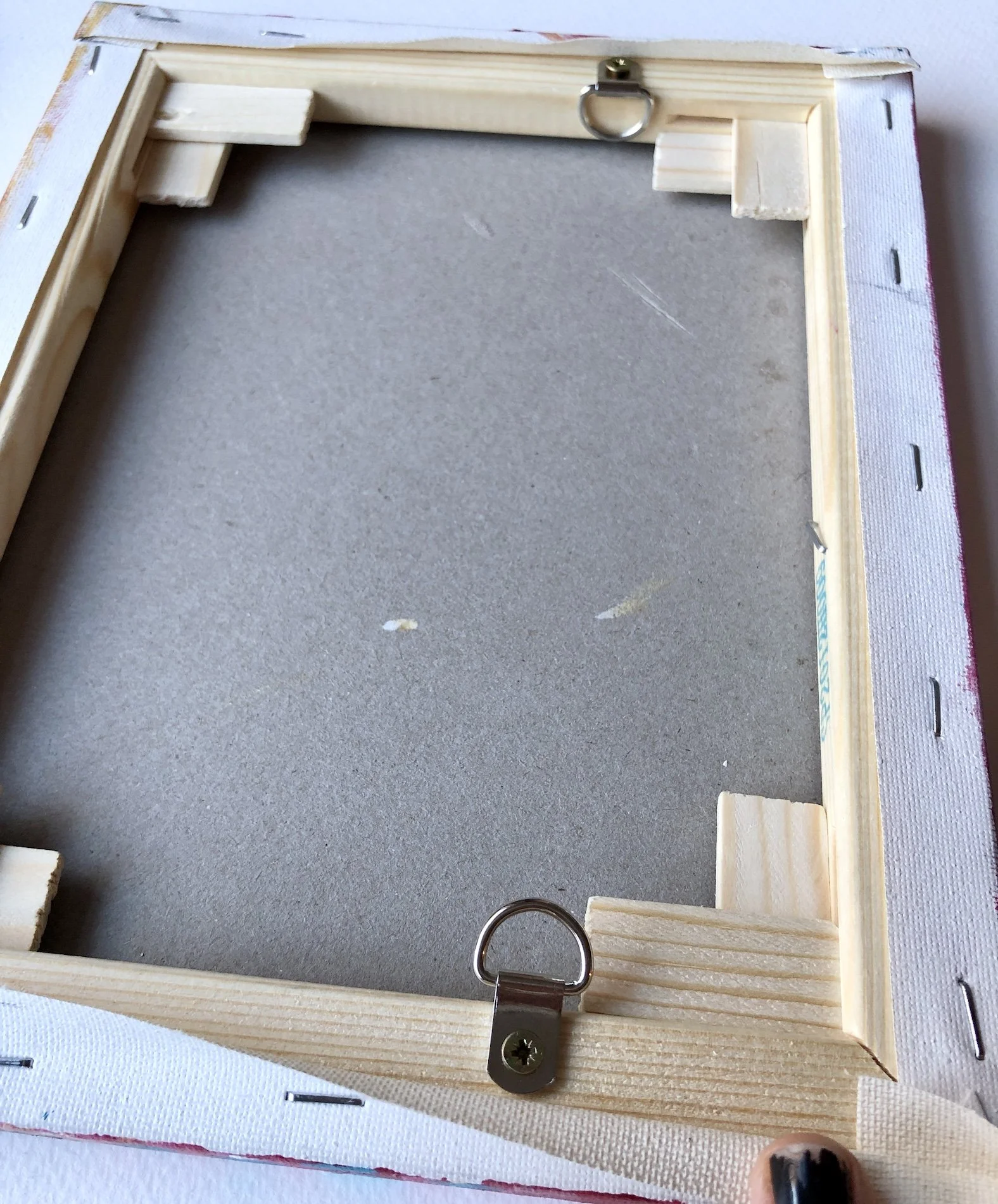 how-to-attach-hanging-wire-to-a-canvas-painting-in-7-steps-with-photos
