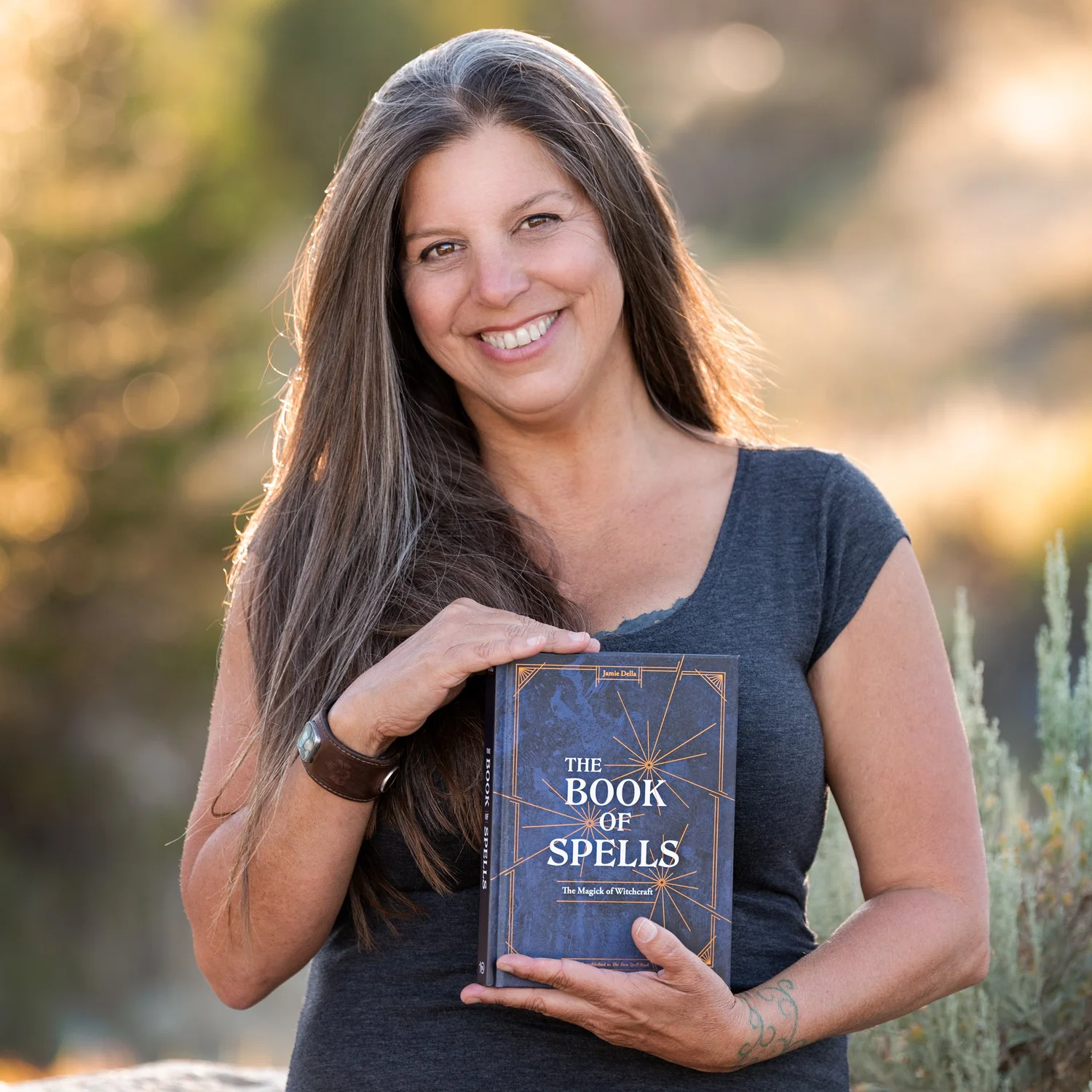 The Book of Spells — Jamie Della