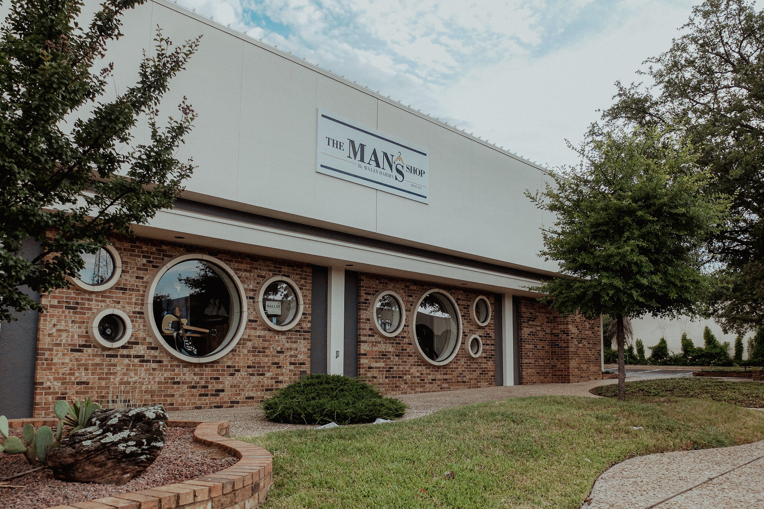 ABOUT — The Man's Shop