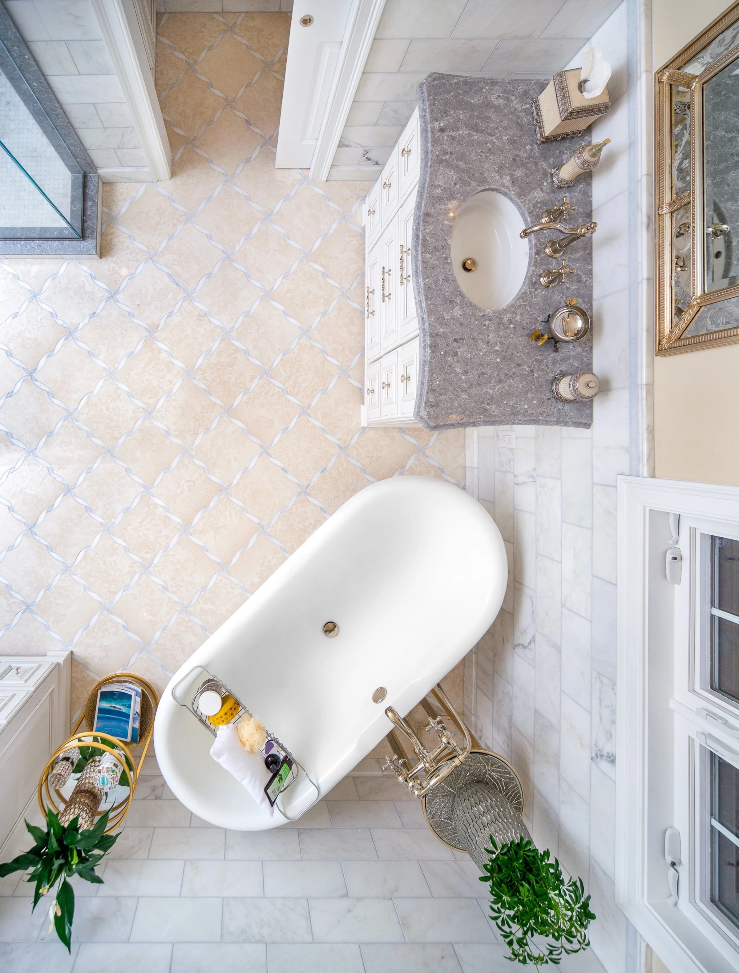 A photo gallery of a marble bathroom remodeled by Goedecke Design ...