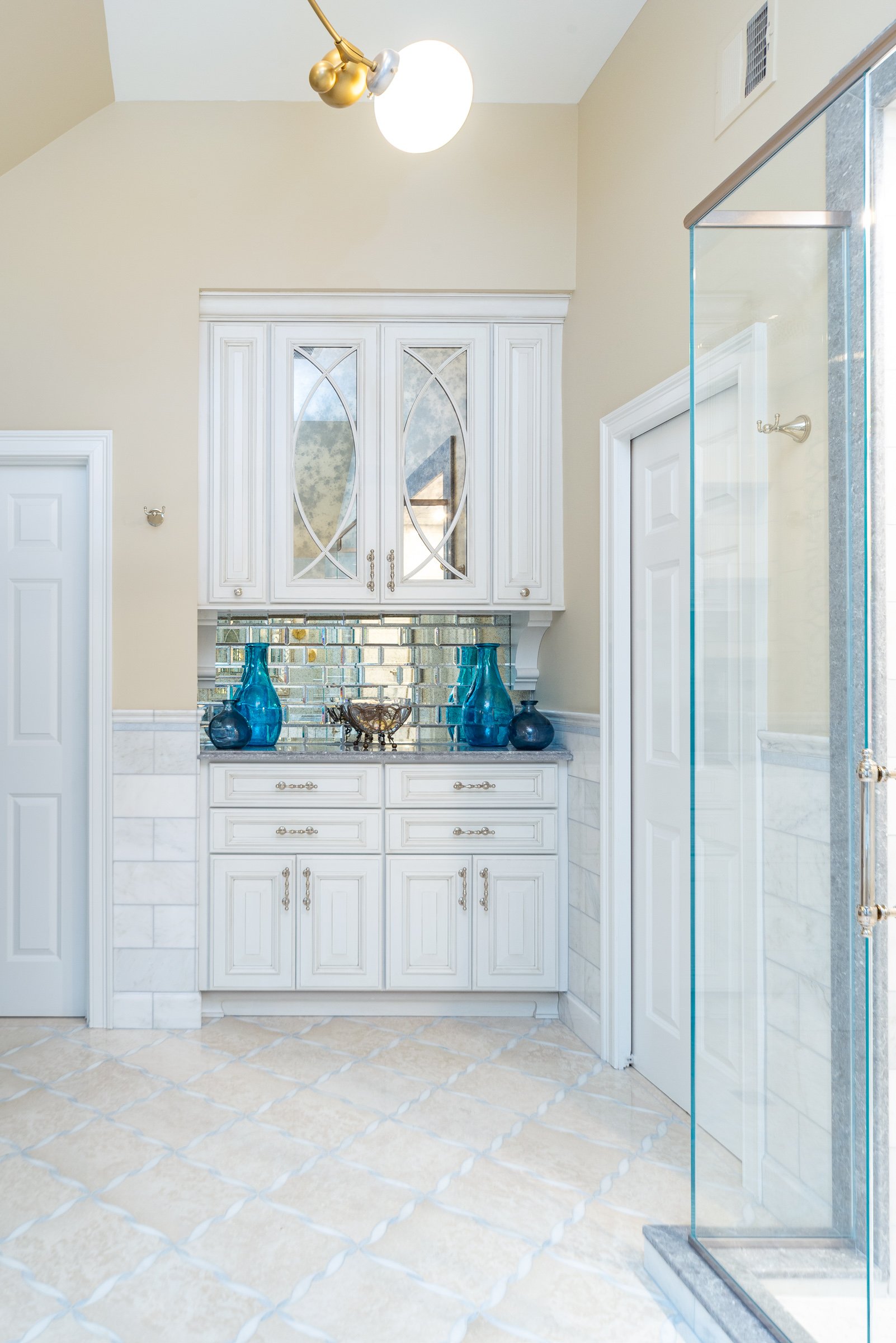 A photo gallery of a marble bathroom remodeled by Goedecke Design ...