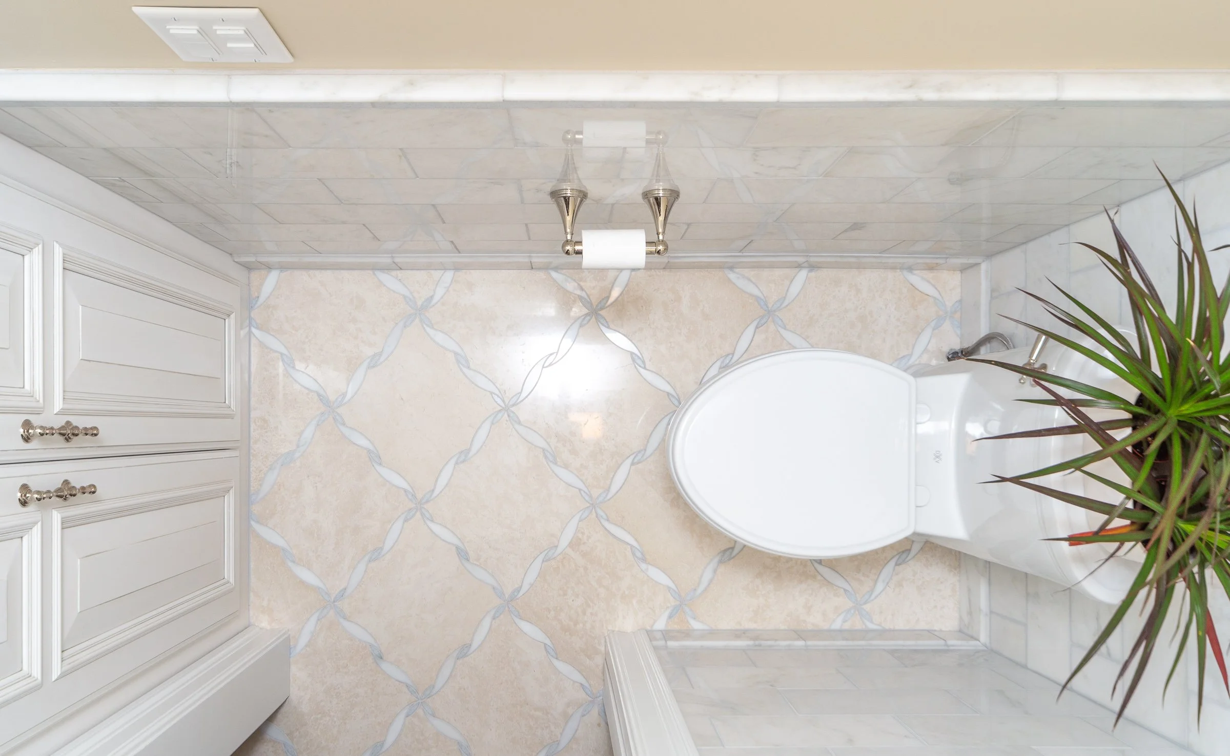 A photo gallery of a marble bathroom remodeled by Goedecke Design ...