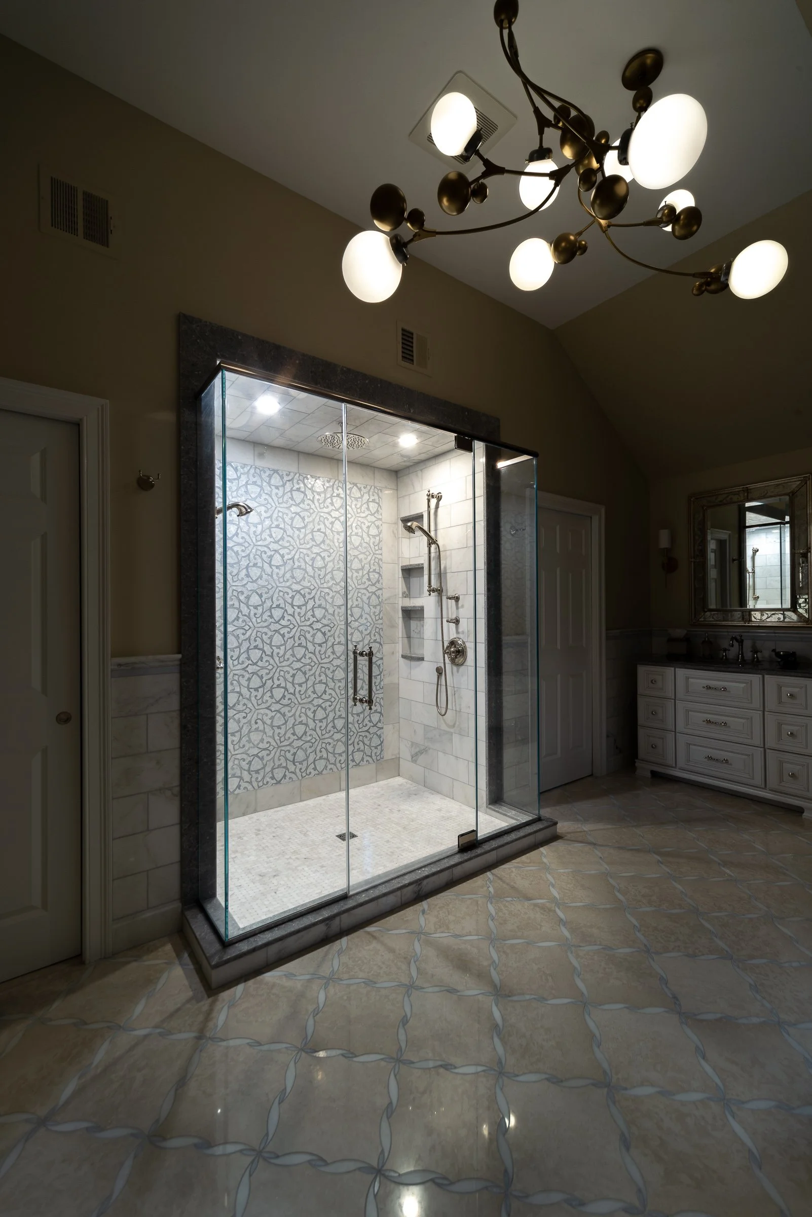 A photo gallery of a marble bathroom remodeled by Goedecke Design ...