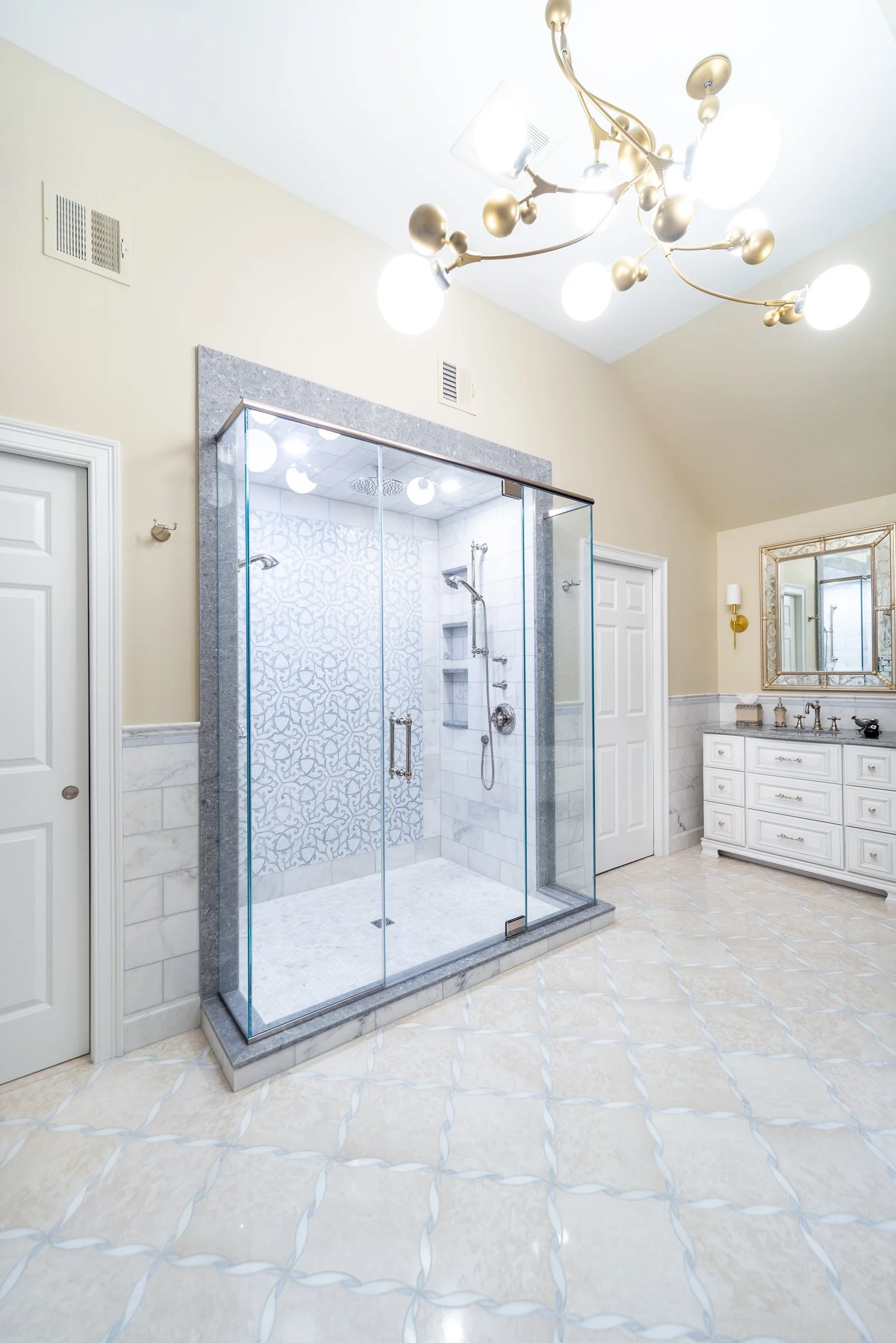 A photo gallery of a marble bathroom remodeled by Goedecke Design ...