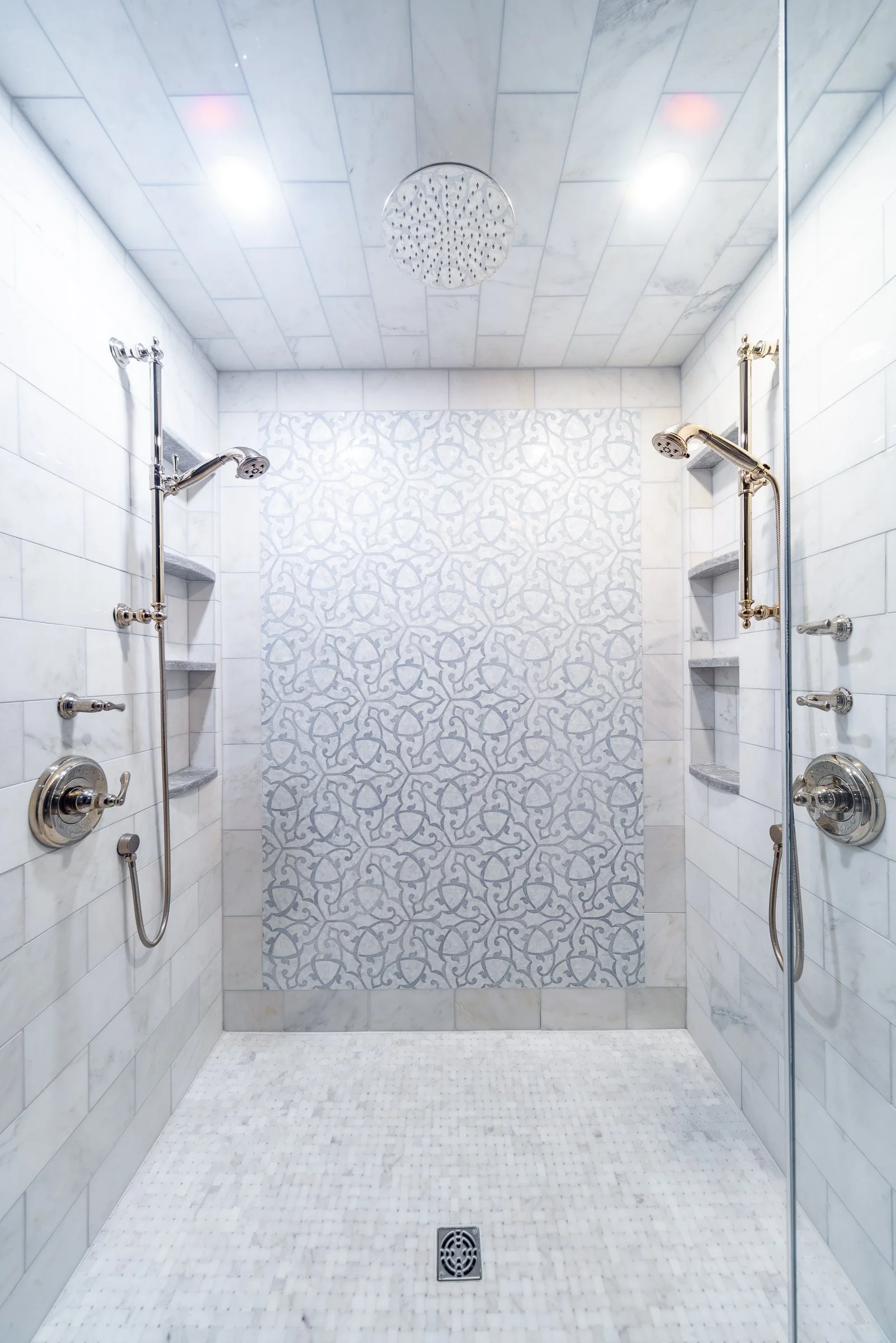 A photo gallery of a marble bathroom remodeled by Goedecke Design ...