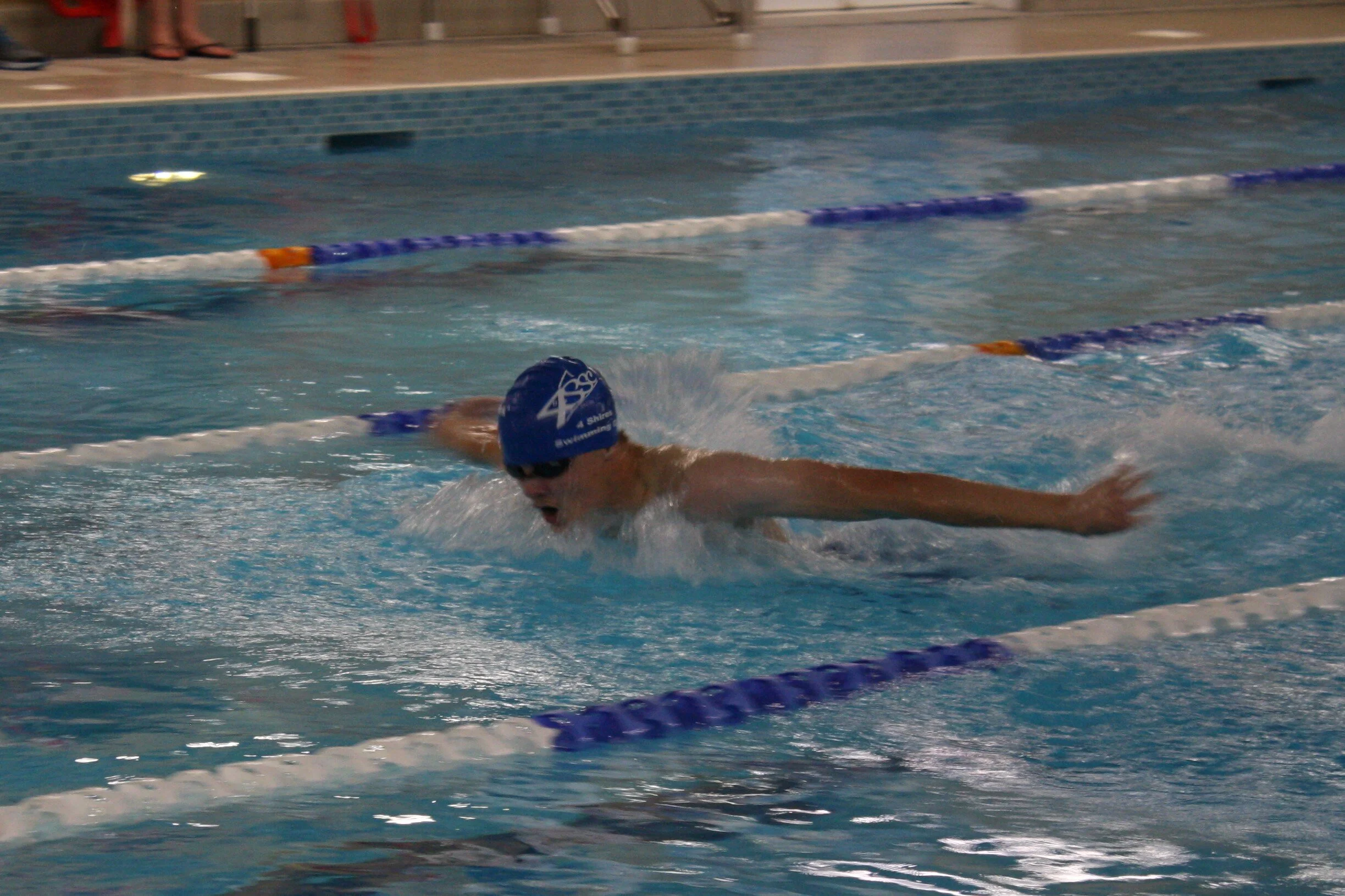 About 2 — 4 SHIRES SWIMMING CLUB