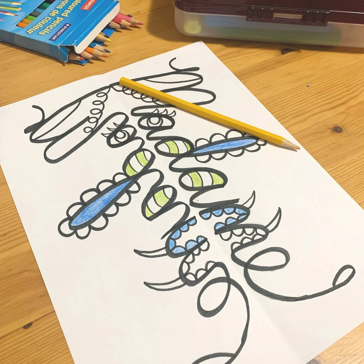 Cursive Creatures Name Symmetry Art Project — Mme Marissa