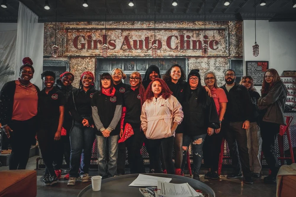 High School Club for young women learn how to do oil changes at Girls ...