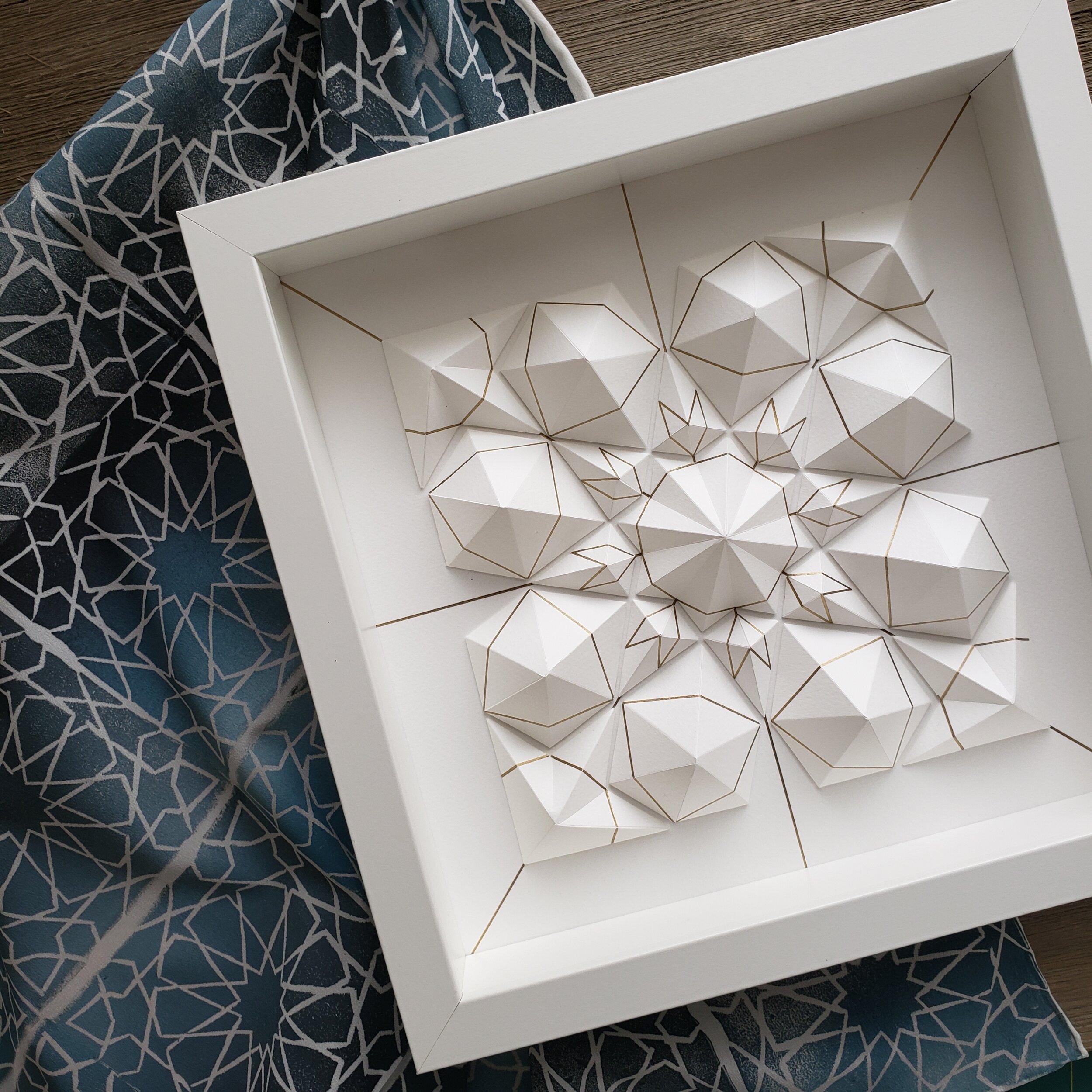 Complex 3D engineered sculptural art made from paper using geometric ...