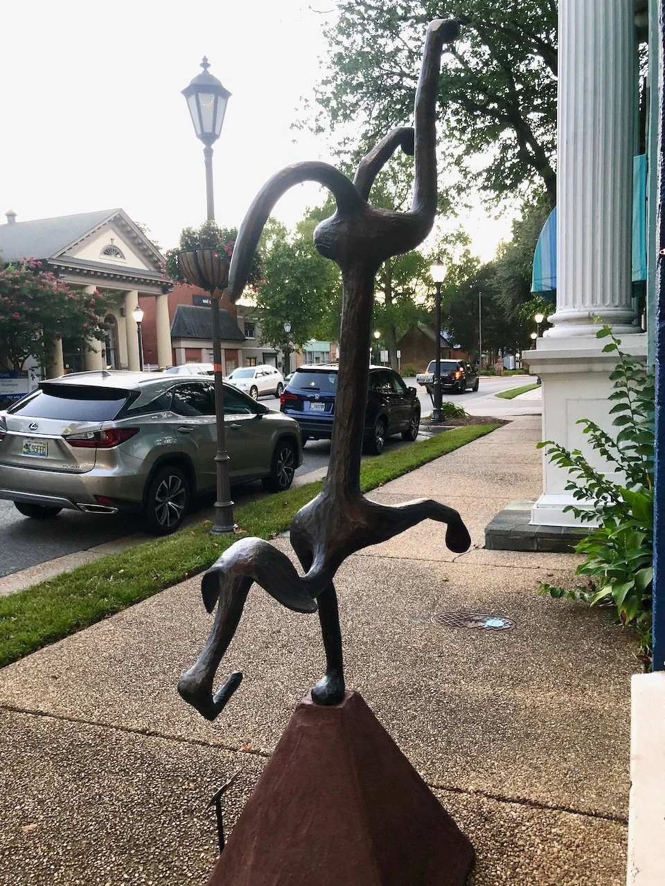 Speedo — Jay Lagemann - Sculpture Child flying on his bike. Exuberant ...