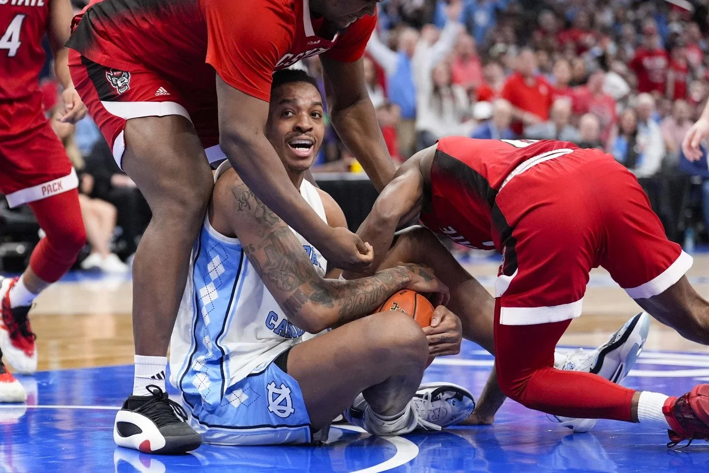 North Carolina State Outlasts North Carolina, Punches Ticket to Tourney ...