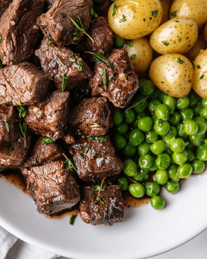 Rosemary Garlic Beef Tips with Lemon Butter Peas & Potatoes — Chompions