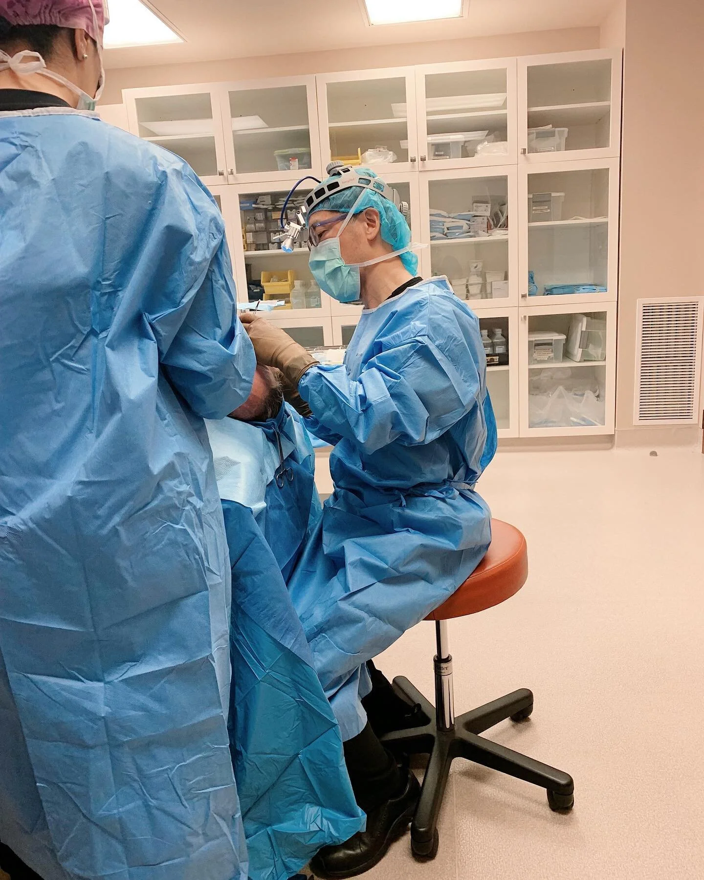 Dr. Mikel Lo — About Faces Cosmetic Surgery and Med Spa