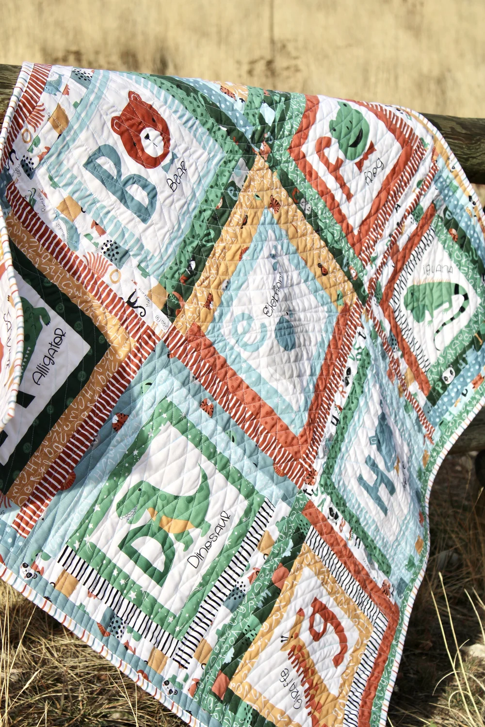 Fussy Cut Log Cabin Baby Quilt — Bayhill Studio