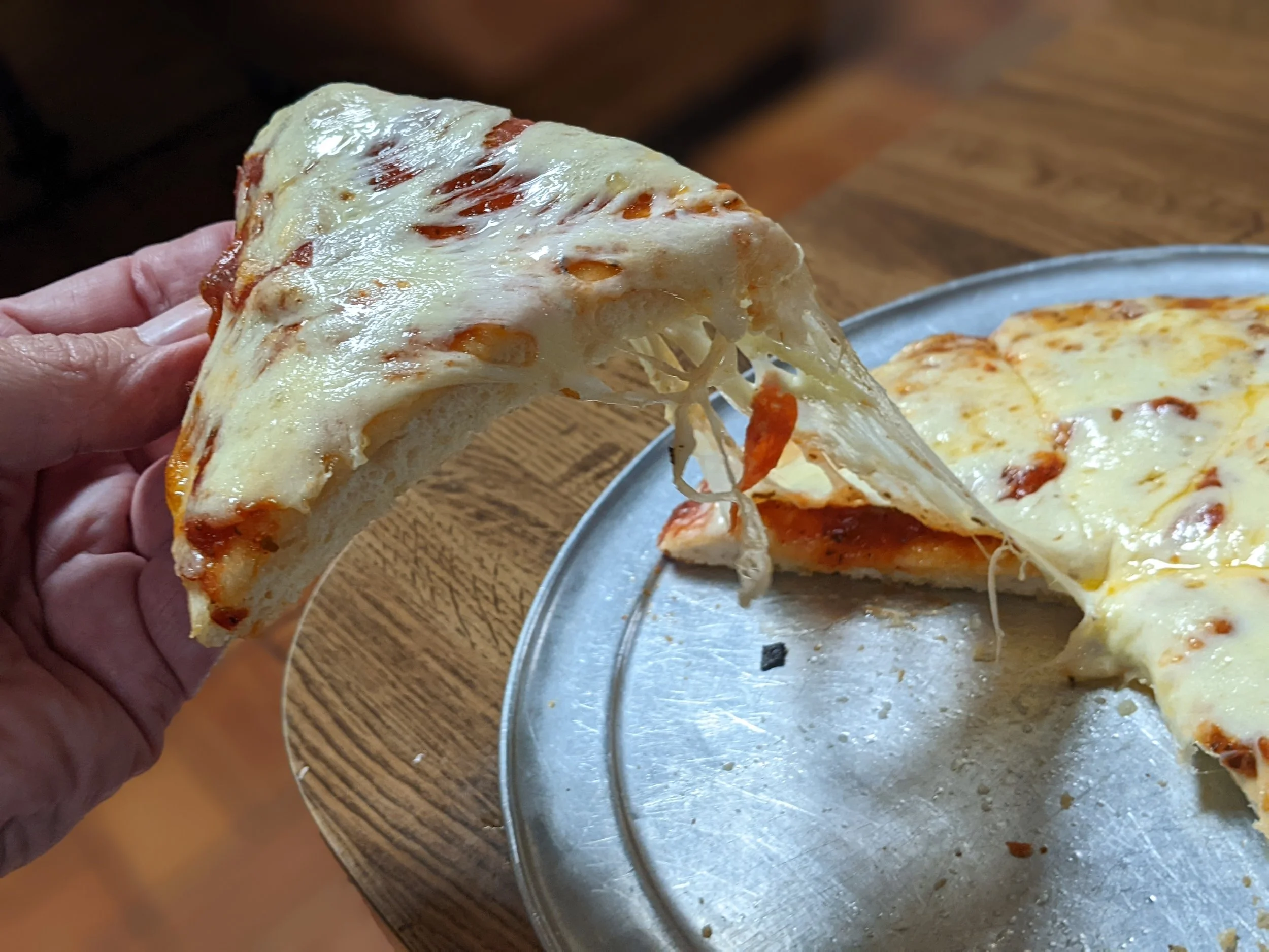The Taste Bud: A Gooey Trip Back in Time to Angilo’s Pizza — Kevin Gibson