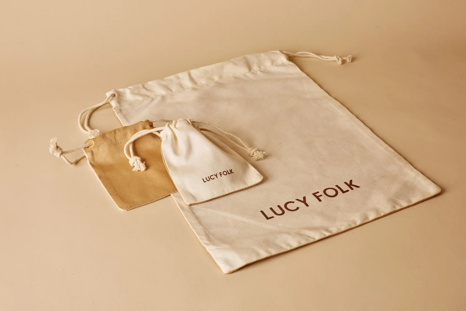 Lucy Folk Bespoke Jewellery Packaging — Contain