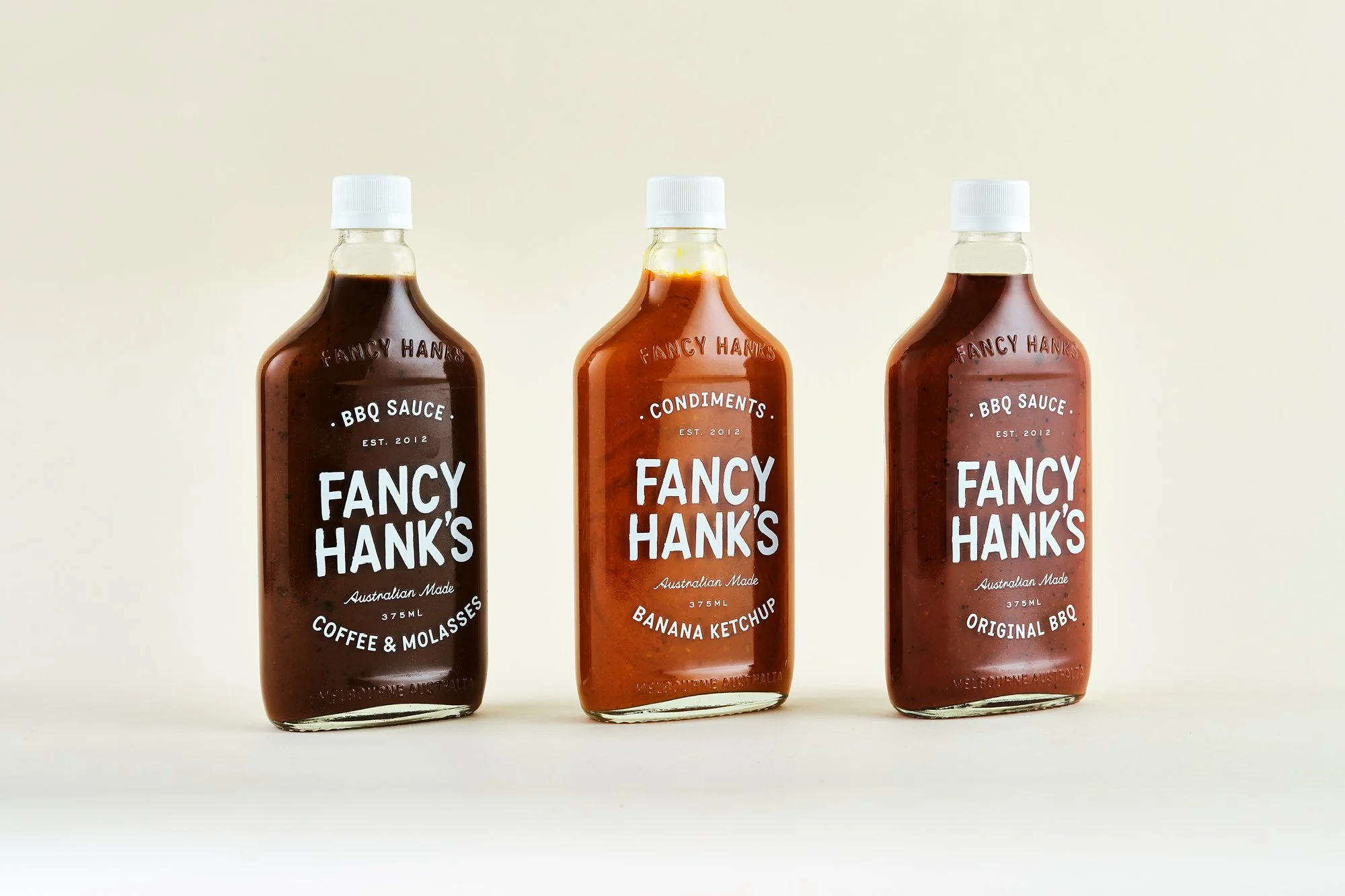 Fancy Hanks Sauce Bottle Range — Contain
