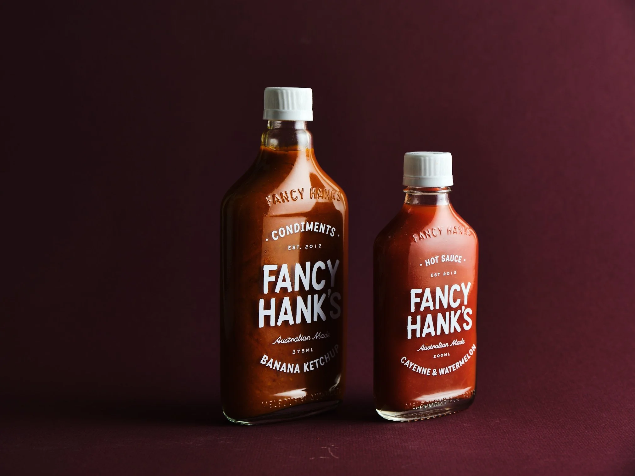 Fancy Hanks Sauce Bottle Range — Contain