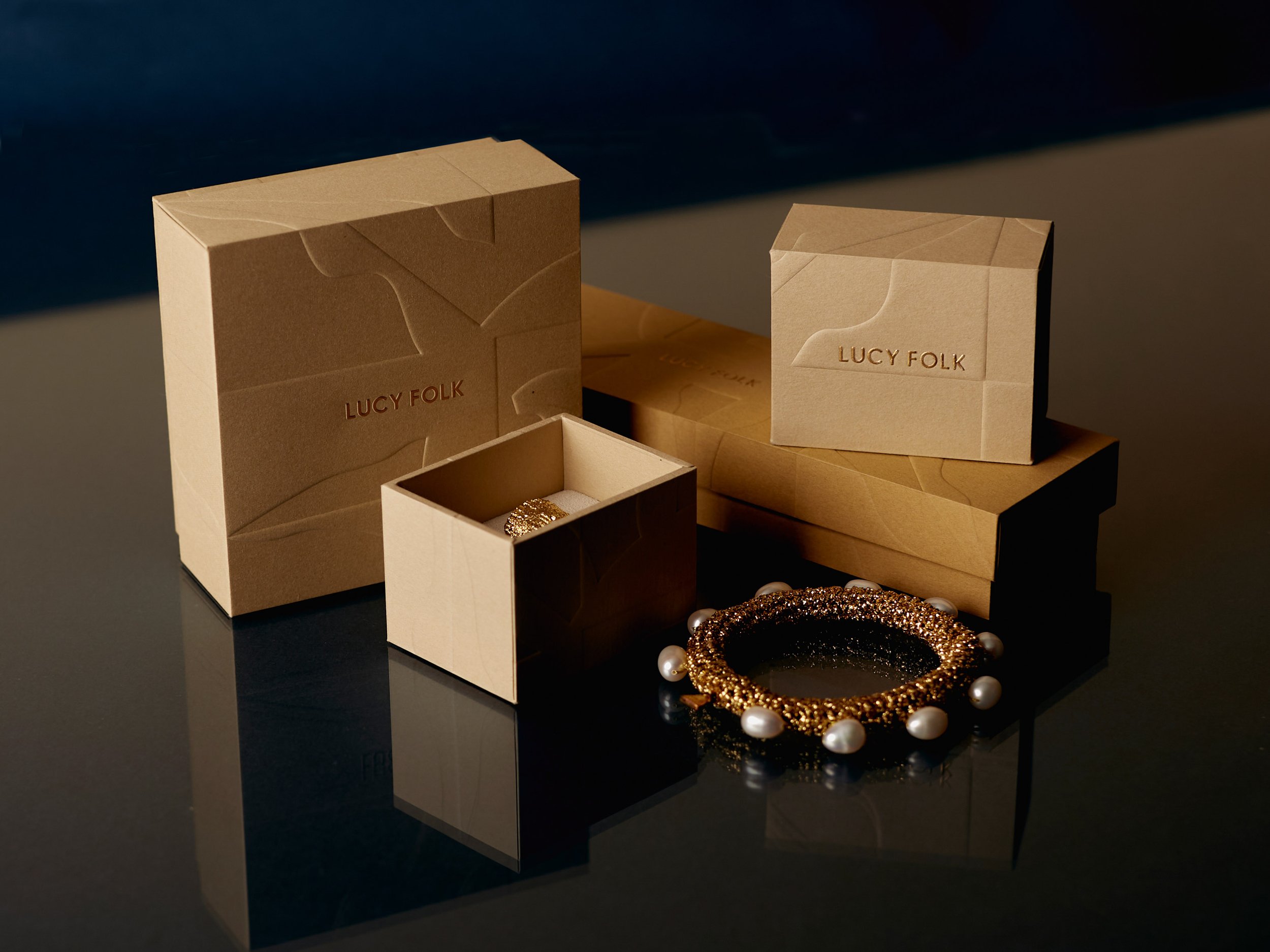 Contain — Design-led production, packaging & merch