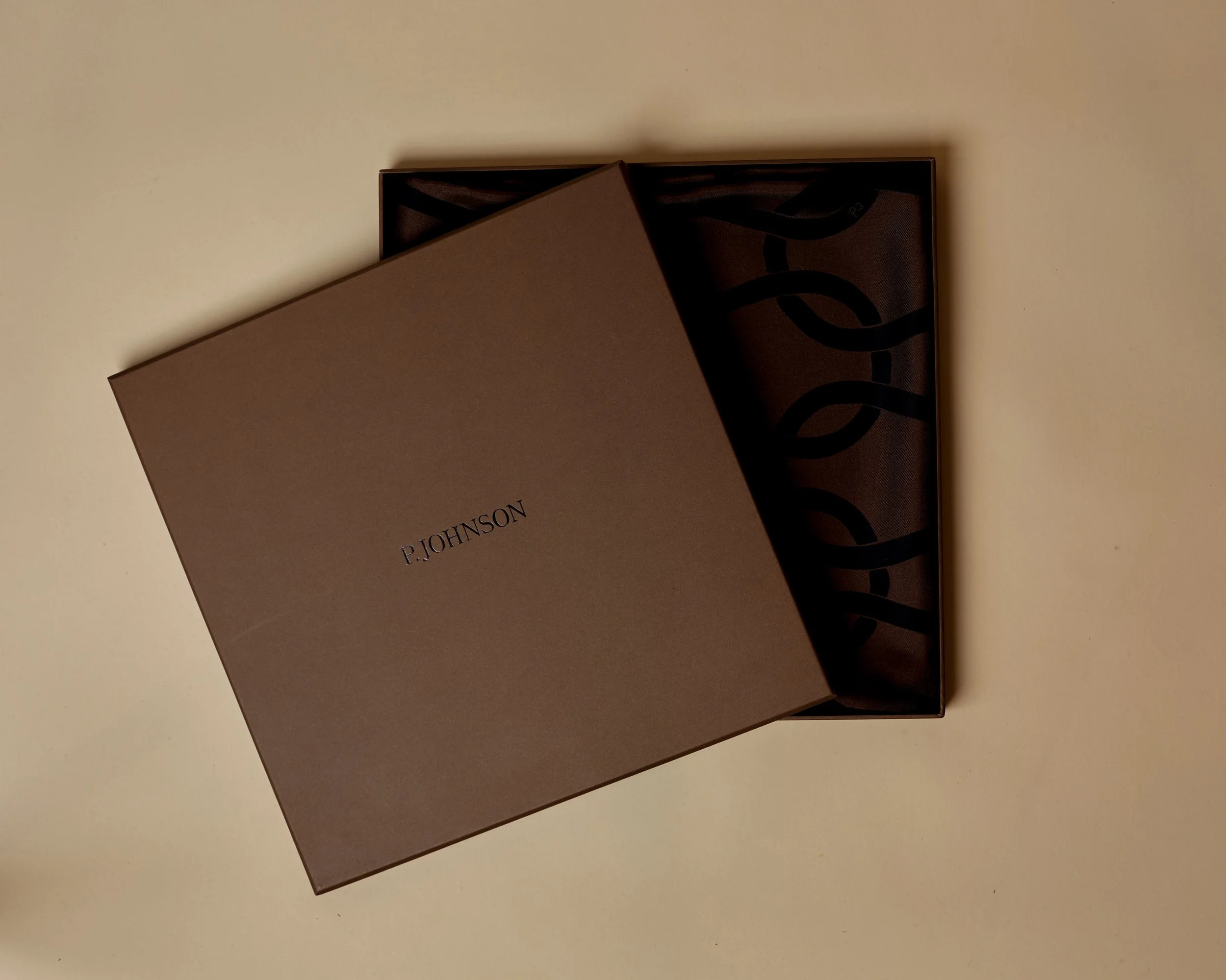 P.Johnson Packaging — Contain