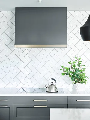 Check out this amazing kitchen with a sliding stone backsplash ...