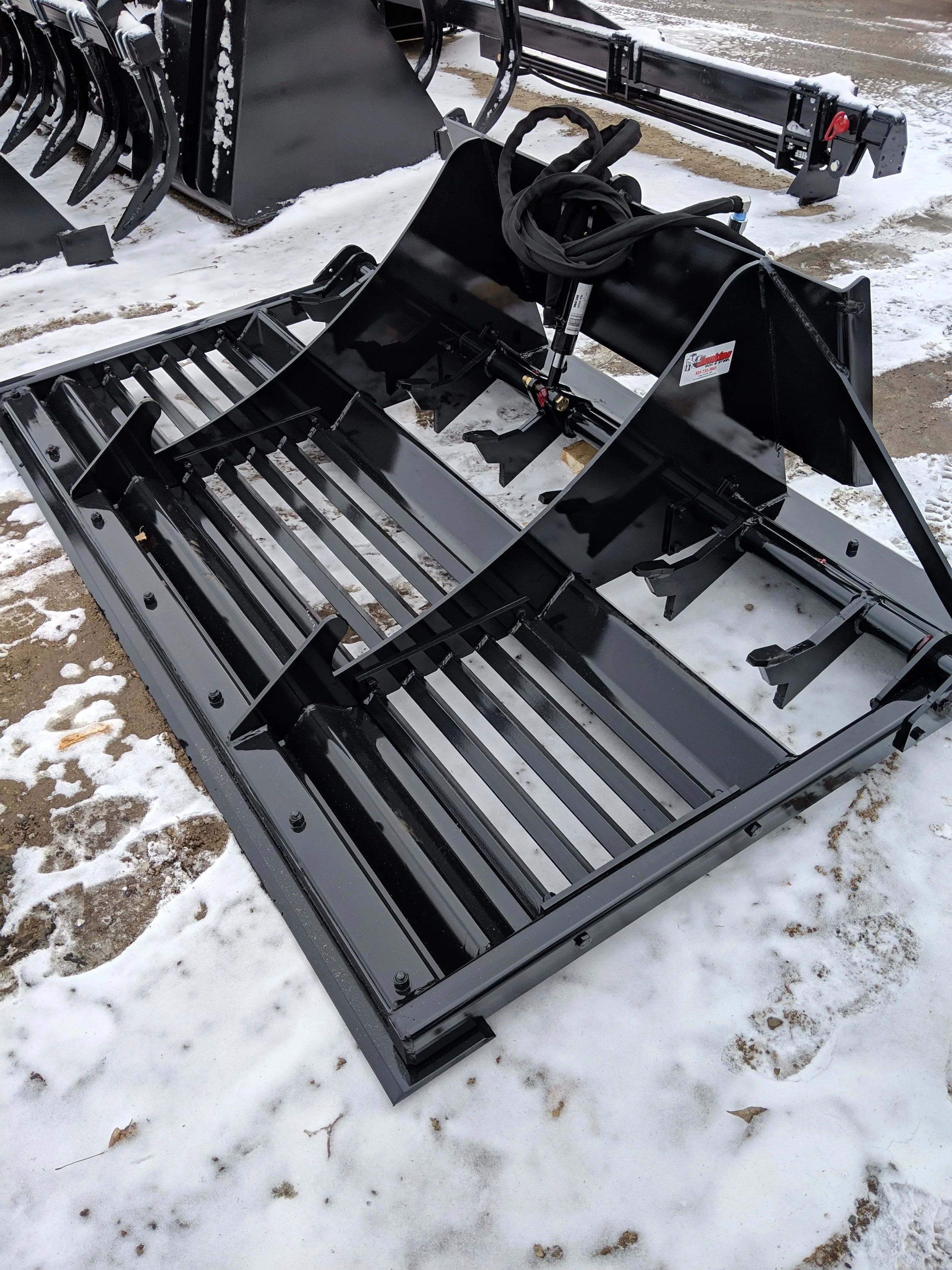Jenkins Extendable Boom — NH Skid Steer Attachments