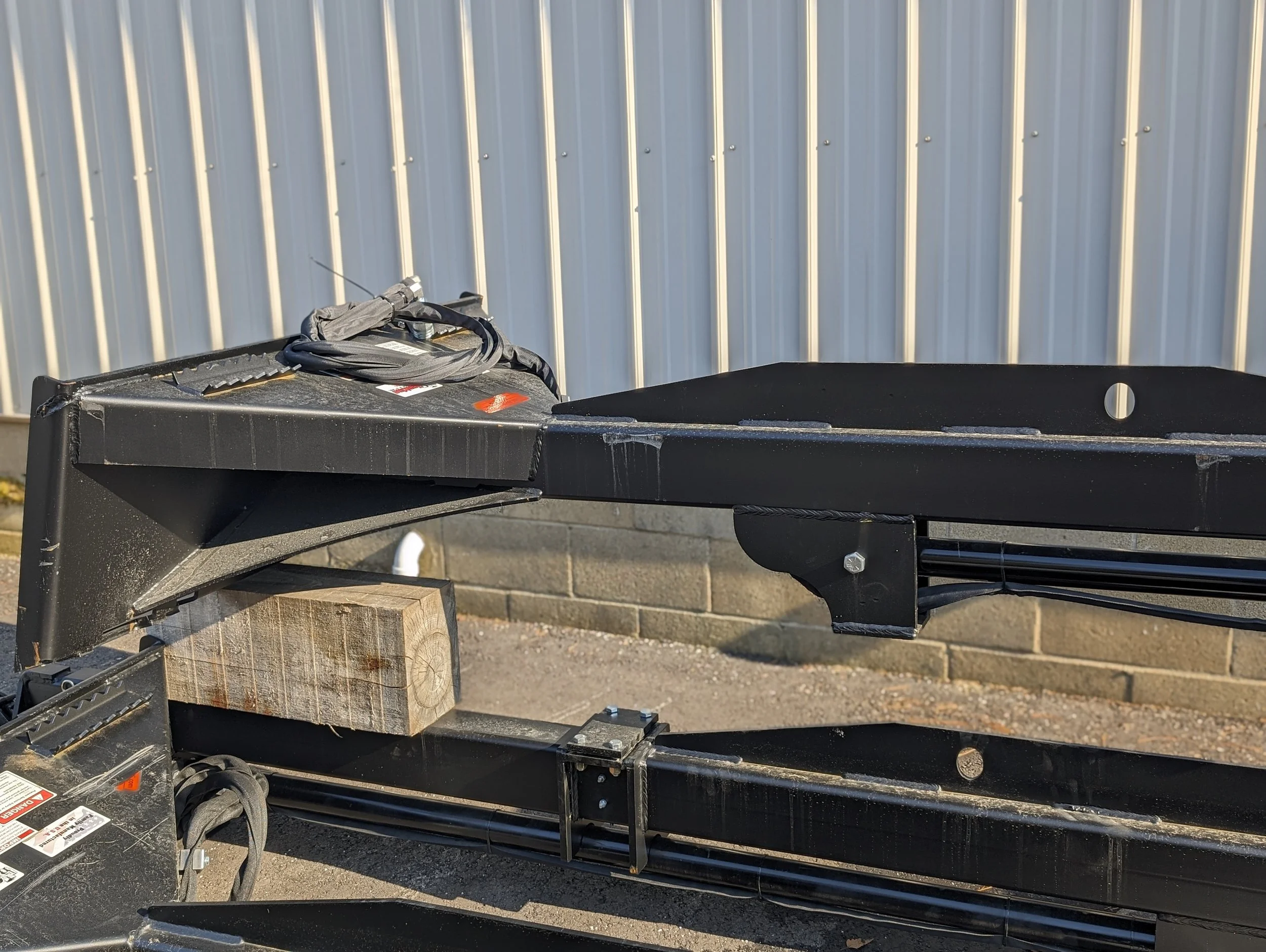 Jenkins Extendable Boom — NH Skid Steer Attachments