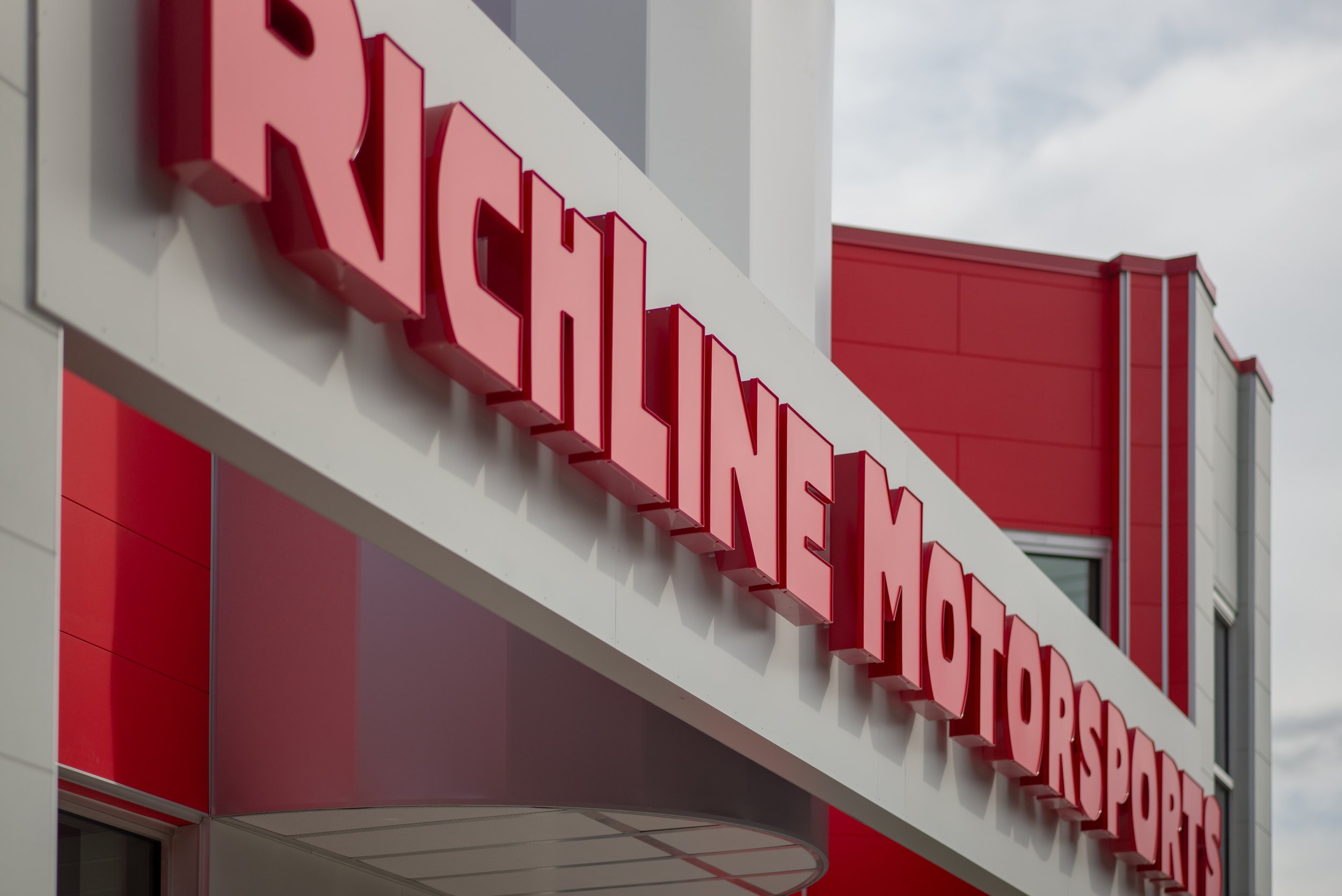 Richline Motorsports | Modern Showroom & Retail Store Design | Kansas ...