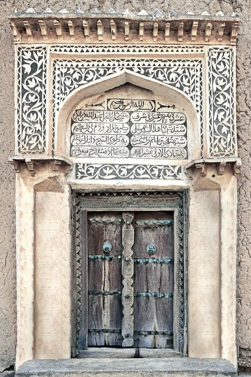 Carved and painted wooden doors were a common feature of Oman's pre ...