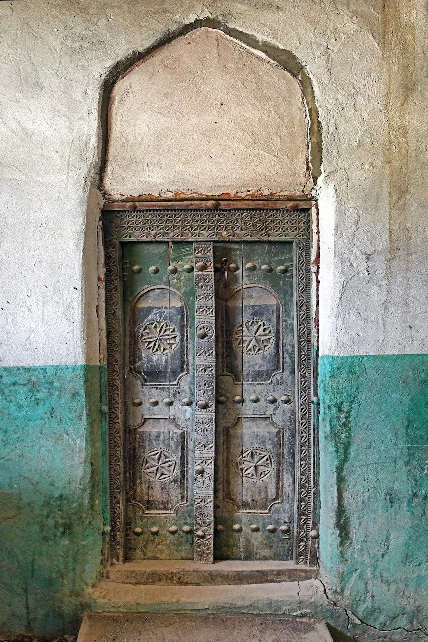 Carved and painted wooden doors were a common feature of Oman's pre ...