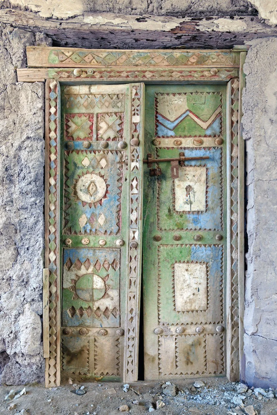 Carved and painted wooden doors were a common feature of Oman's pre ...