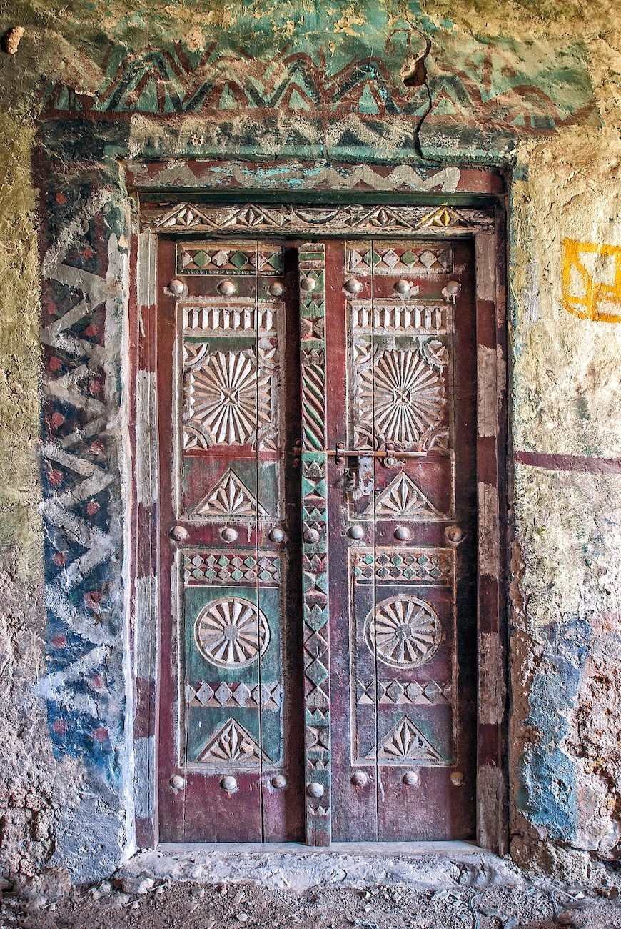 Carved and painted wooden doors were a common feature of Oman's pre ...