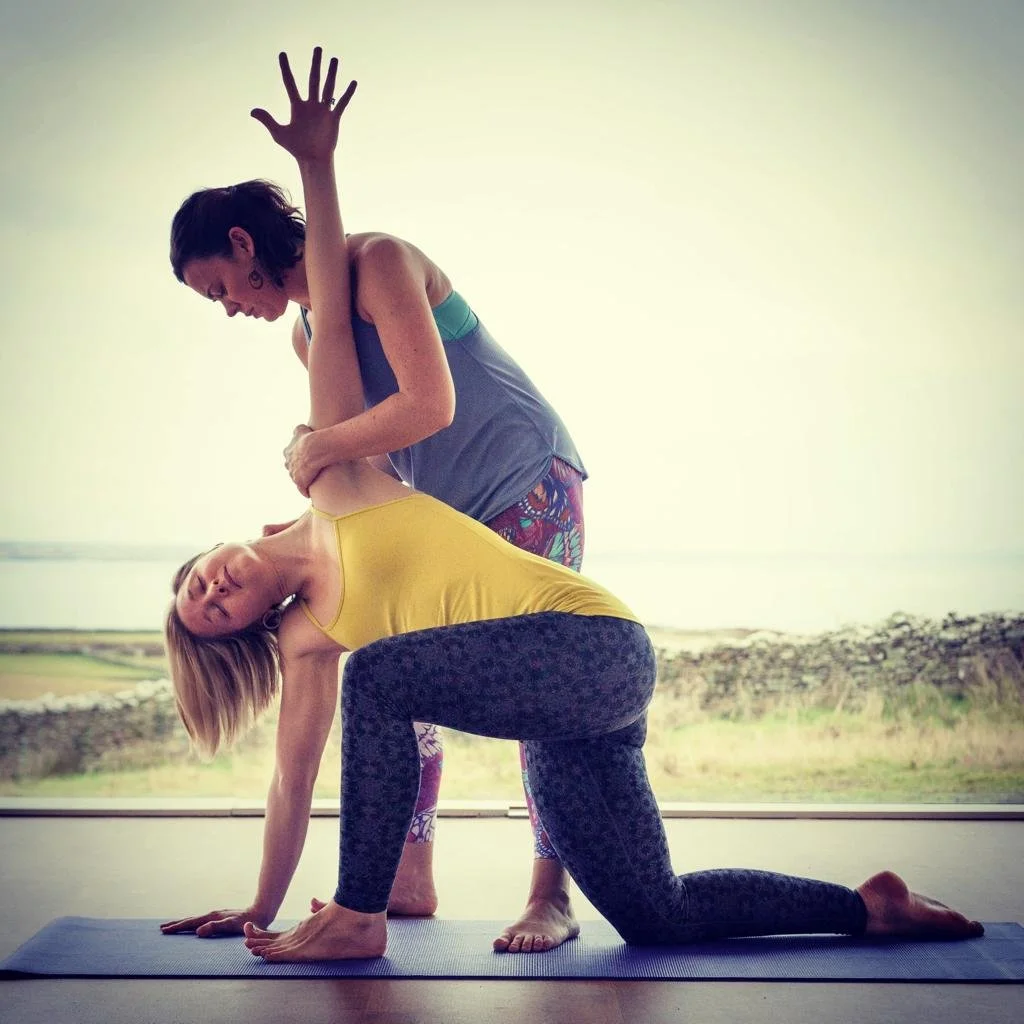 Assisting Yoga Teacher