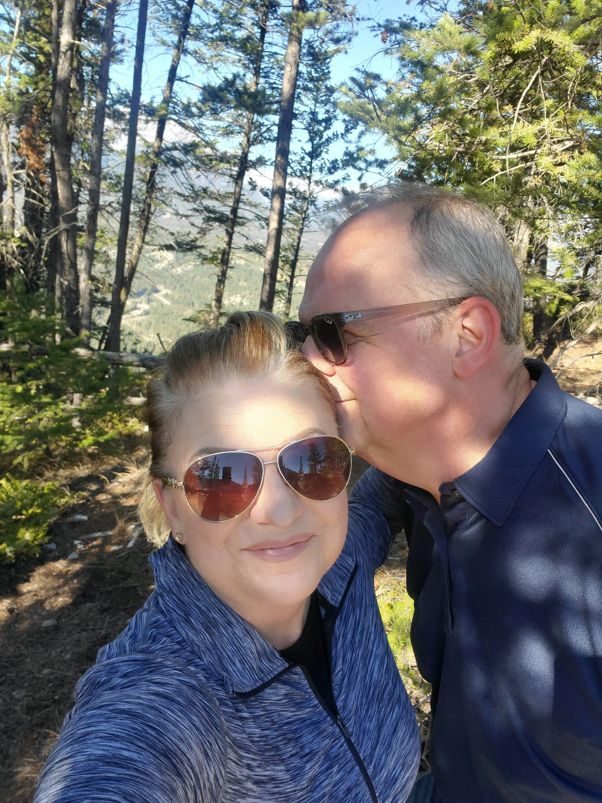 Maple Leaf Ridge Canmore Home — Happy Midlife Couple