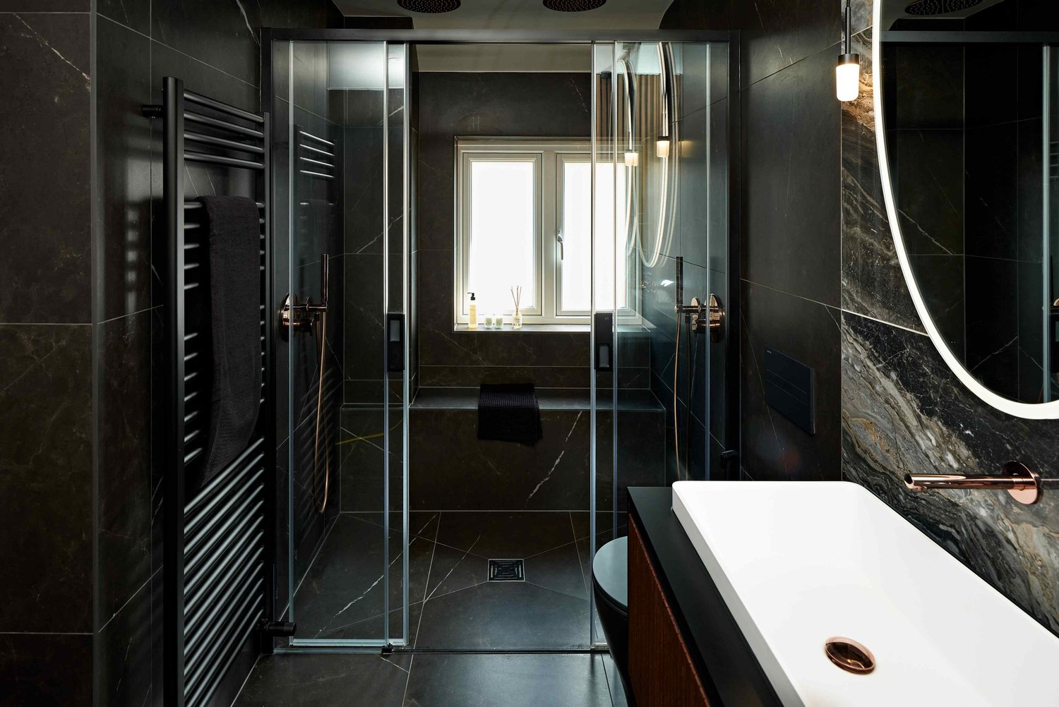 Bathroom Design: Dramatic Bathroom with Marble-Effect Tiles and Wooden ...