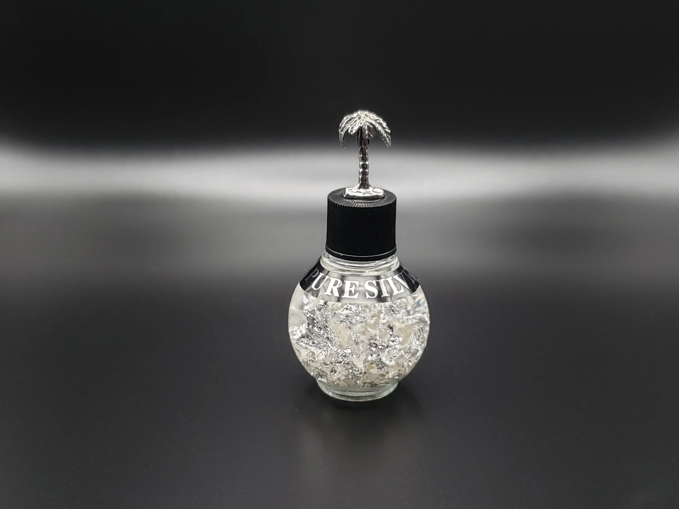 Silver Ball with Small Pewter Figurine | Treehouse Silver